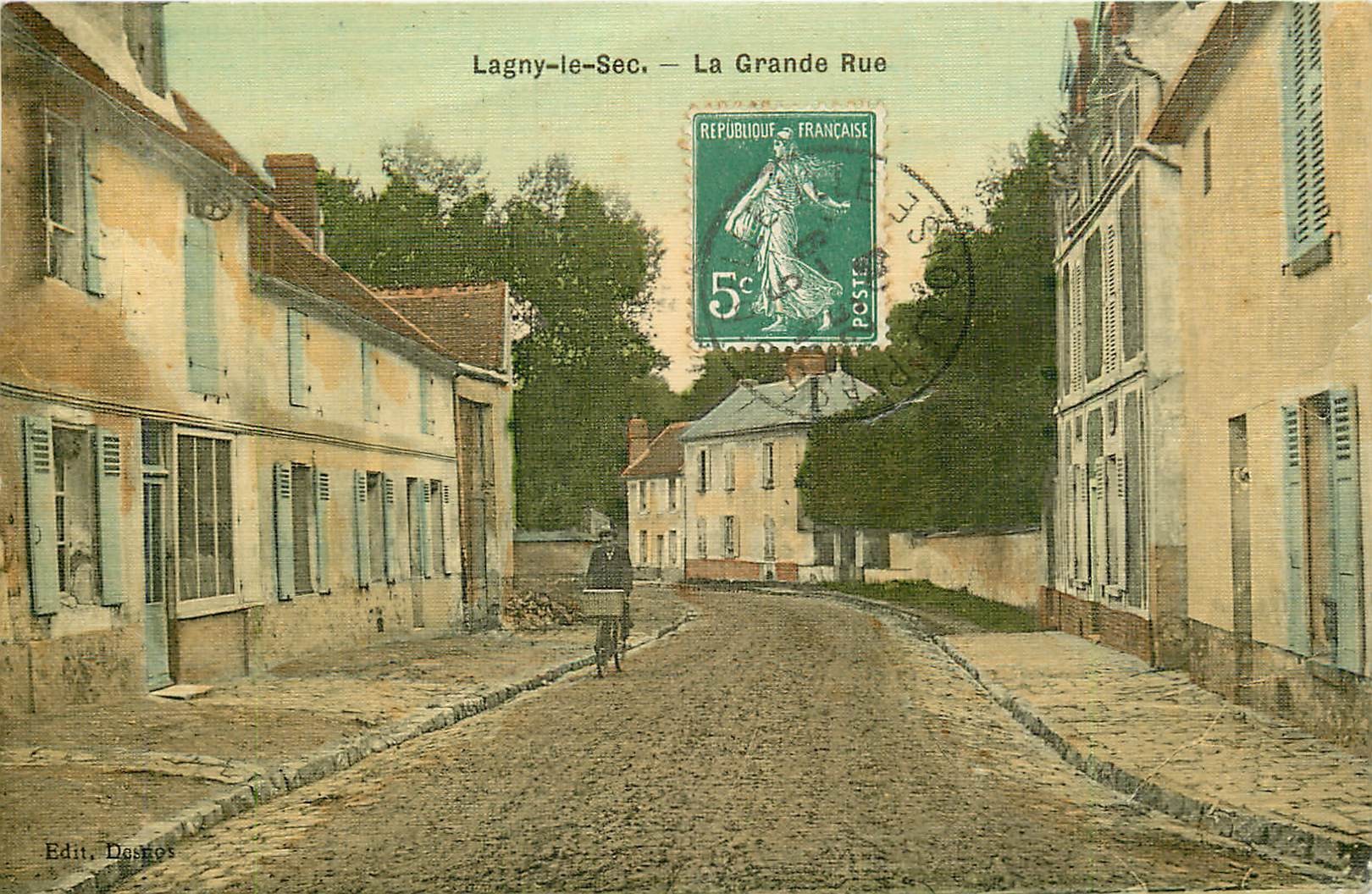 60 LAGNY-LE-SEC. Cycliste sur la Grande Rue vers 1909